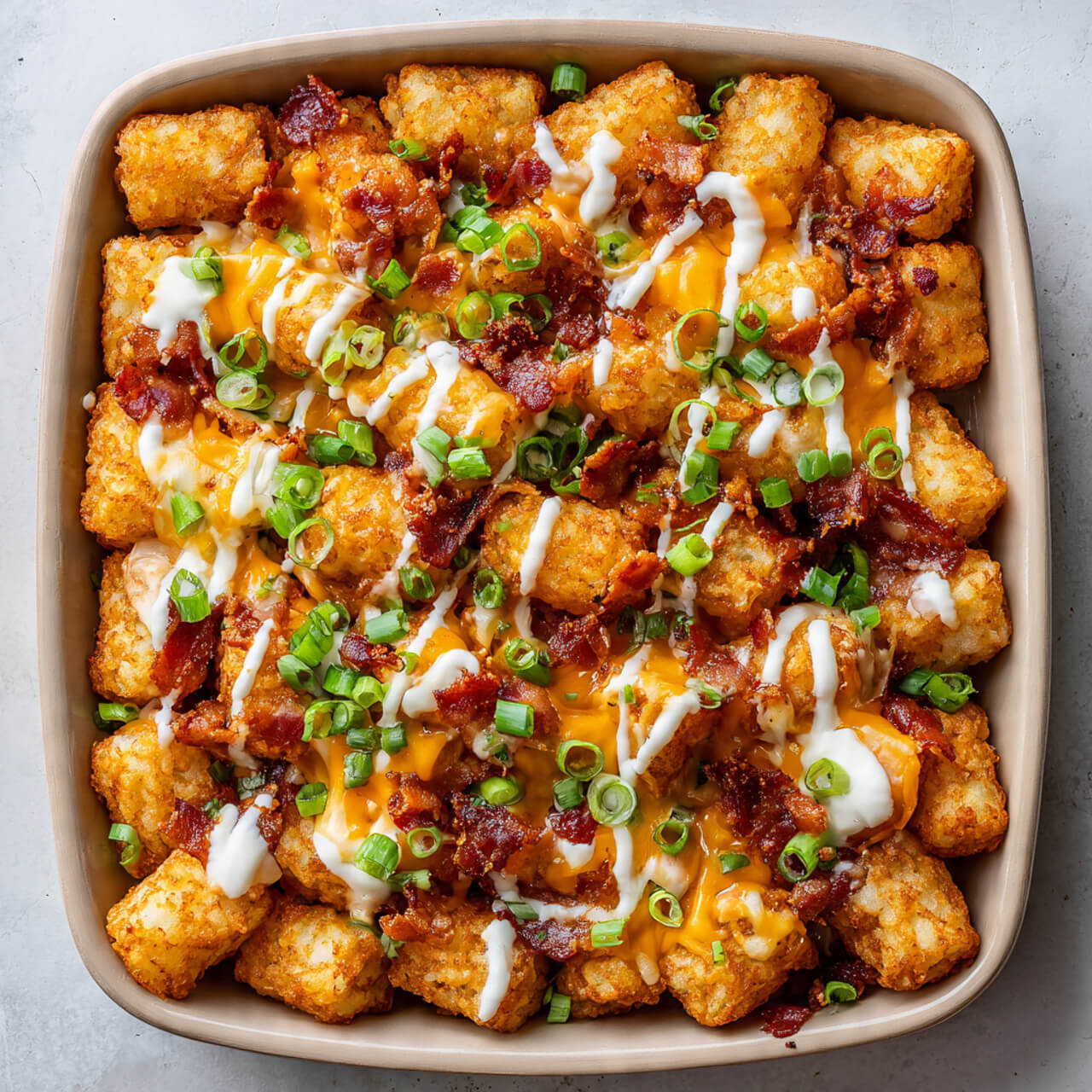 Crispy tater tots with spicy cheese sauce | bbqblaze.com
